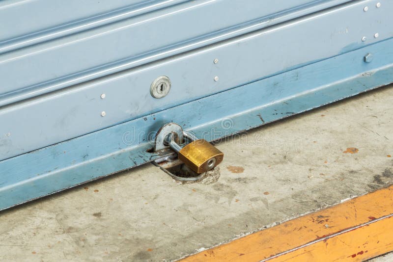 Shutter Door with Key Locked Stock Photo - Image of store, factory ...