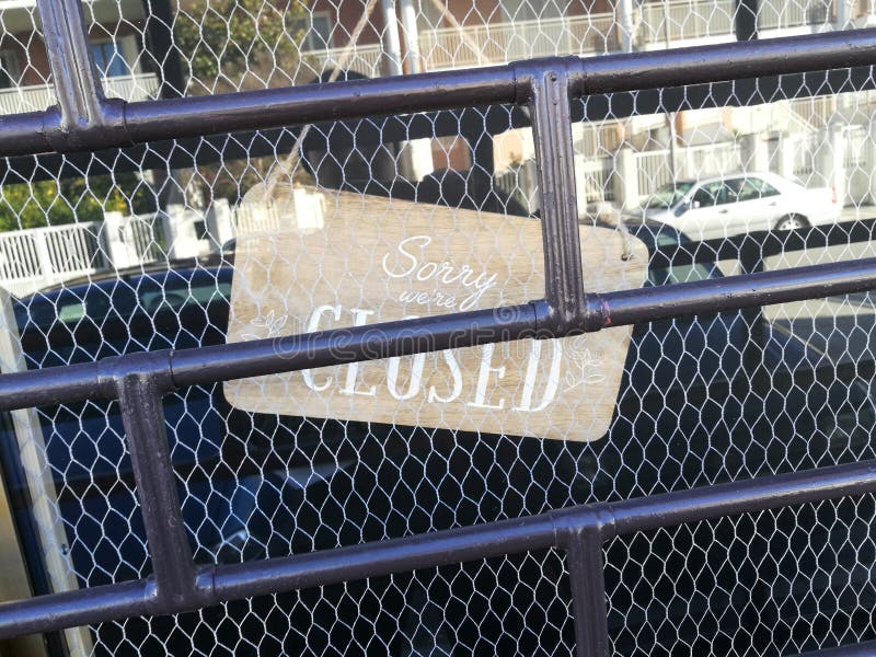 Shutter Down with Sign we are Closed Stock Photo - Image of background ...