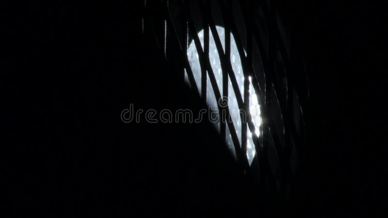 Shutter Stopping in Front of Light with Rack Projecting Stock Footage ...