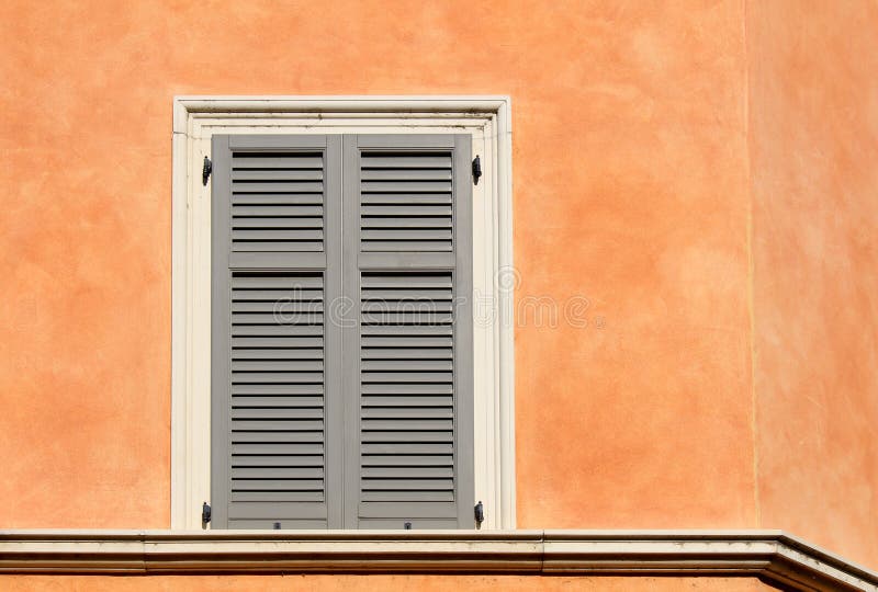 Shutter Window on an Orange Wall Stock Image - Image of rectangular ...