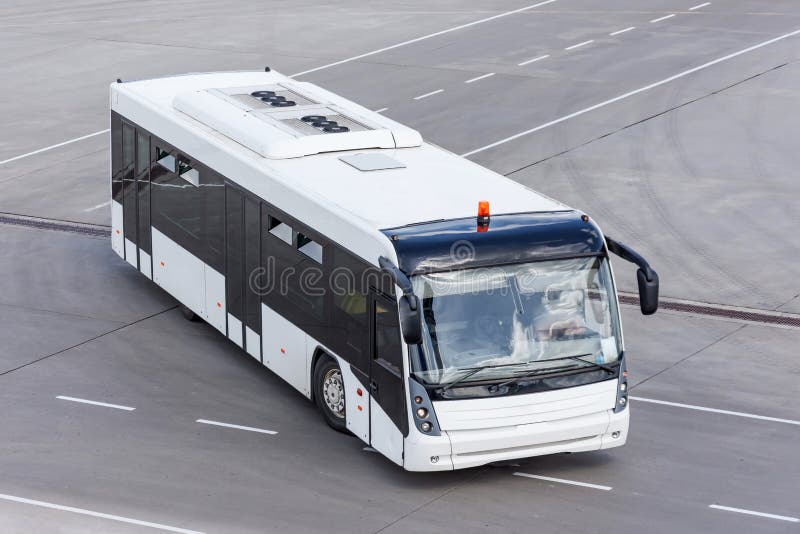 The Shuttle Bus Turns on the Apron of the Airport and Brings Passengers ...