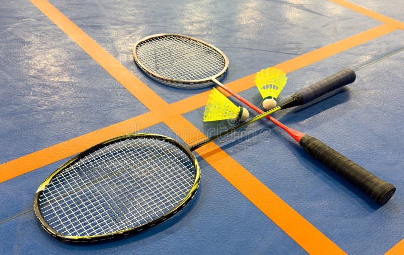 Shuttlecock on Badminton Racquet on Floor. Stock Photo - Image of ...