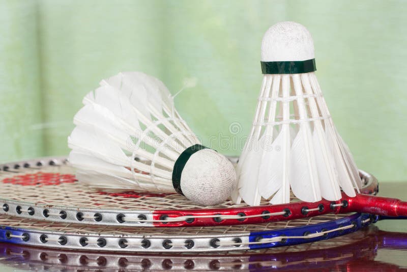 Shuttlecocks and Badminton Racket. Stock Image - Image of floor, match ...