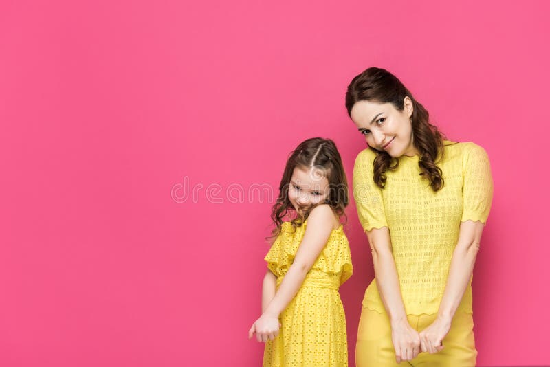 Shy Mother and Daughter Looking at Camera Stock Photo - Image of ...
