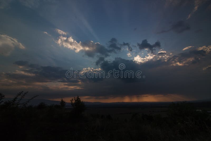 Shy sunset rays. stock photo. Image of fighting, emperors - 144210262