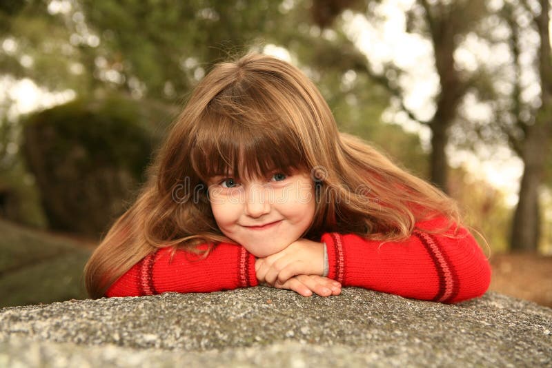 Shy Sweet Child Outdoors on a Rock Stock Image - Image of natural, girl ...