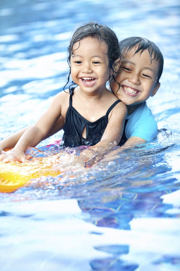 Fun at Swimming Pool stock image. Image of refreshing, happy - 237167