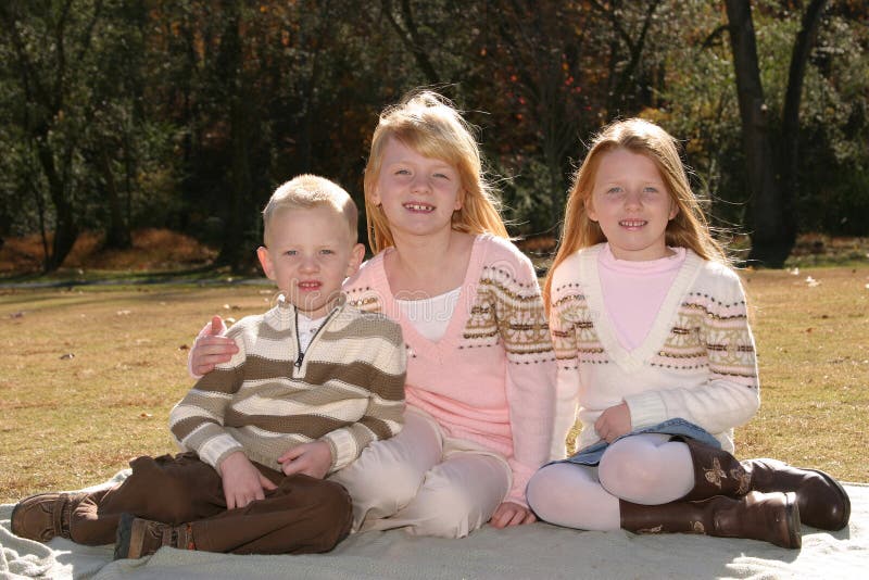 Three siblings posing stock image. Image of black, posing - 13708705