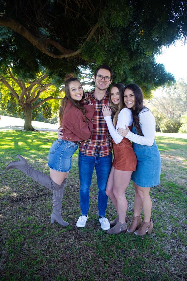 Siblings and Cousins at a Park Stock Photo - Image of happy, youthful ...