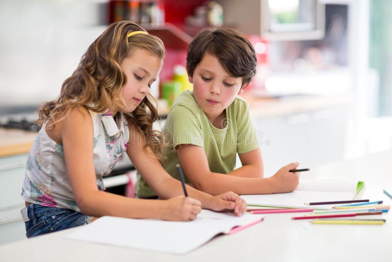 Siblings Doing Homework in Kitchen Stock Image - Image of childhood ...