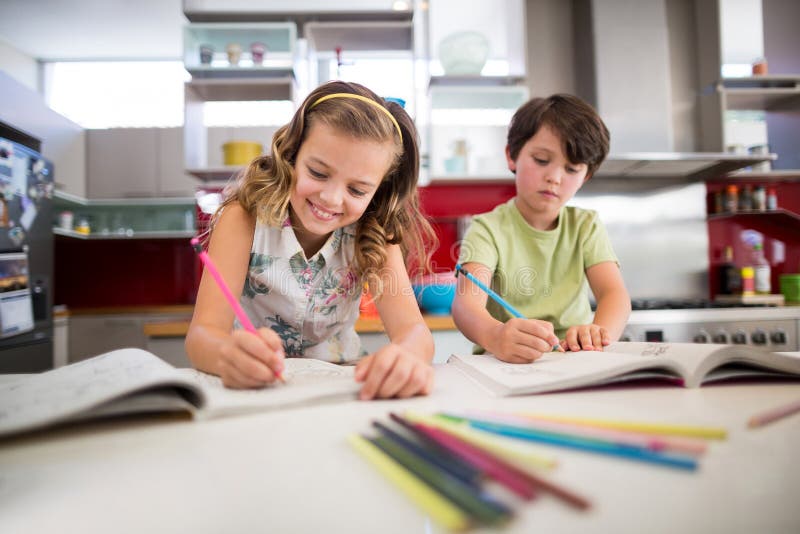 Siblings Doing Homework in Kitchen Stock Image - Image of home ...
