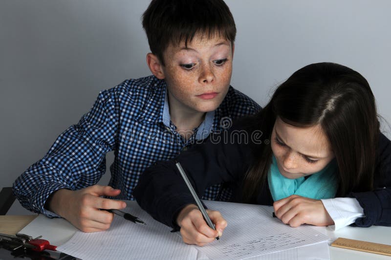 Siblings Doing School Homework Stock Photo - Image of bureau, brother ...