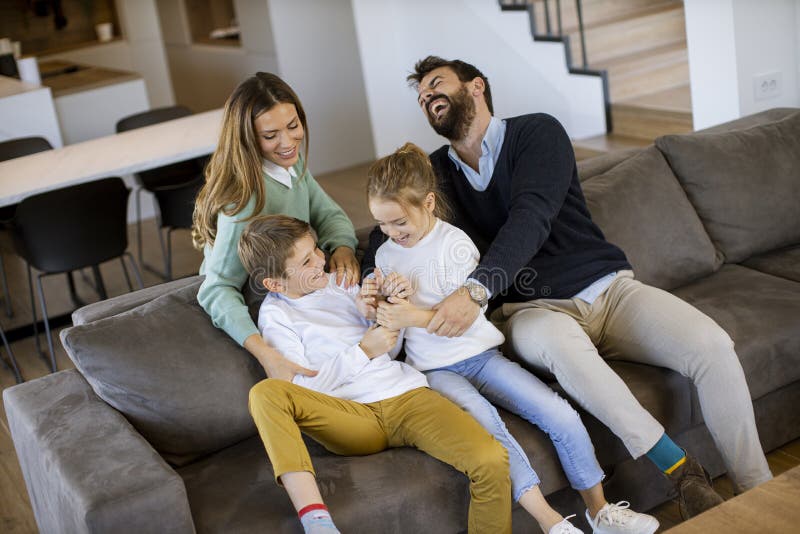 Siblings Fighting Over TV Remote Control at Home Stock Image - Image of ...