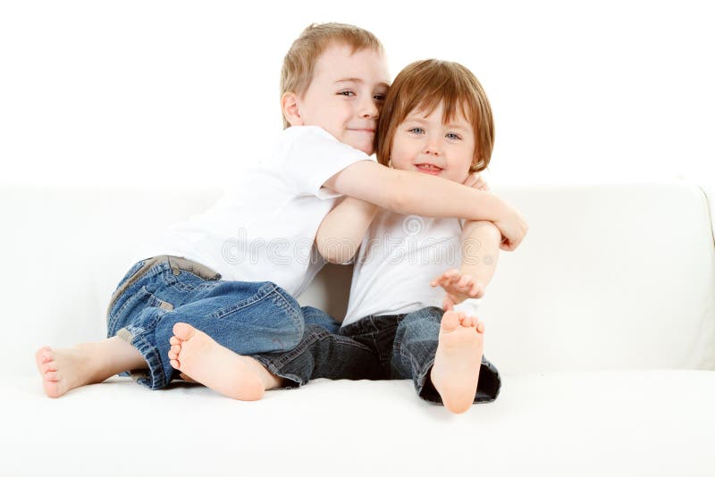 Siblings hugging stock image. Image of young, friendly - 14642289