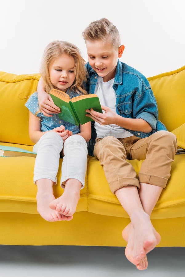 Siblings Reading Book and Sitting Stock Photo - Image of male, kids ...