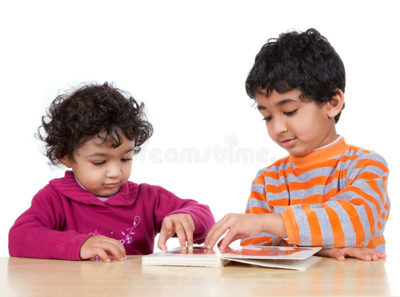 Siblings Reading a Picture Book Together Stock Image - Image of girl ...