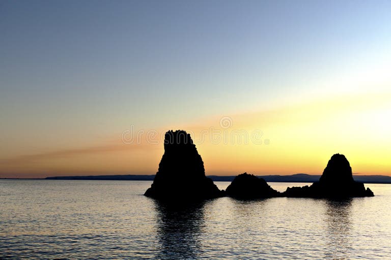 Sicily: Cyclopean Isles in Acitrezza at Sunset. Stock Image - Image of ...
