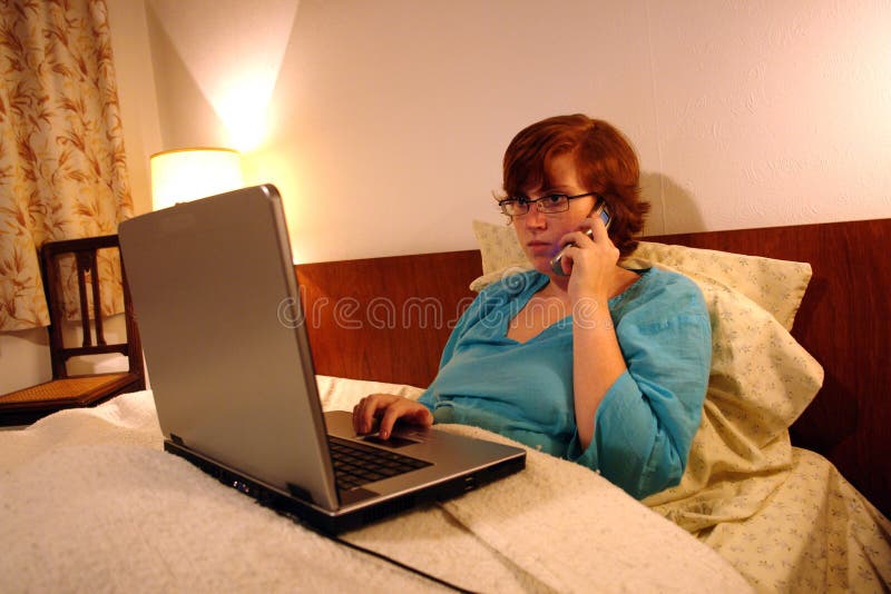 Sick in Bed Working from Home Stock Photo - Image of medicine, cell ...