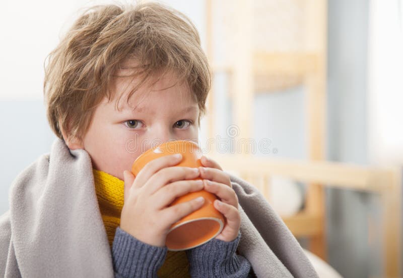 Sick Boy with a Cup of Tea at Home Stock Photo - Image of little, care ...