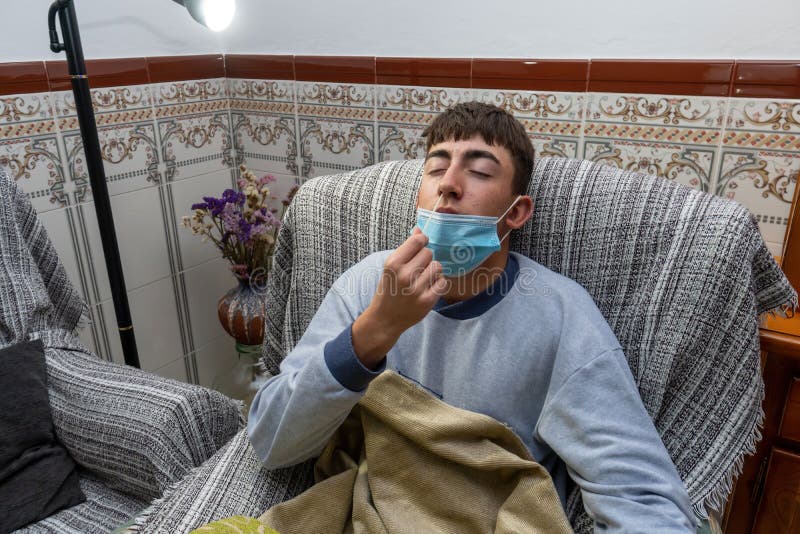 Sick Caucasian Guy Taking a Covid Test at Home Stock Image - Image of ...