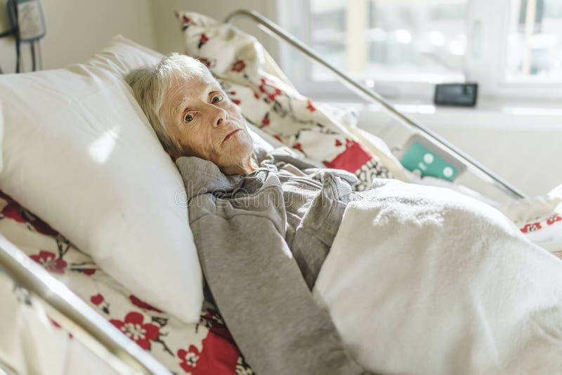 Sick, Elderly Senior Woman in a Hospital Bed Stock Photo - Image of ...