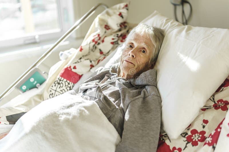 Sick, Elderly Senior Woman in a Hospital Room with Wheel Chair Stock ...