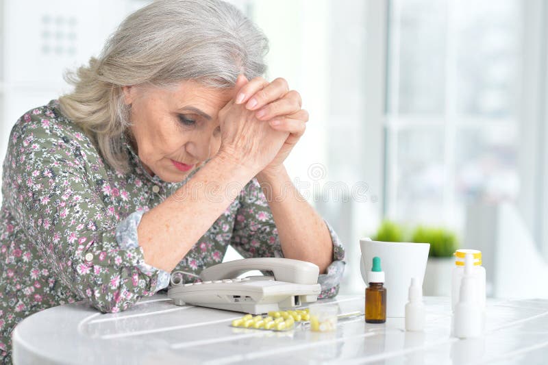 Sick Elderly Woman with Medicines Stock Photo - Image of medications ...