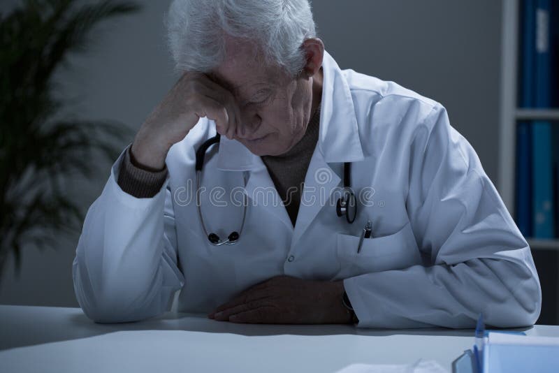 Sick exhausted doctor stock photo. Image of physician - 55327968