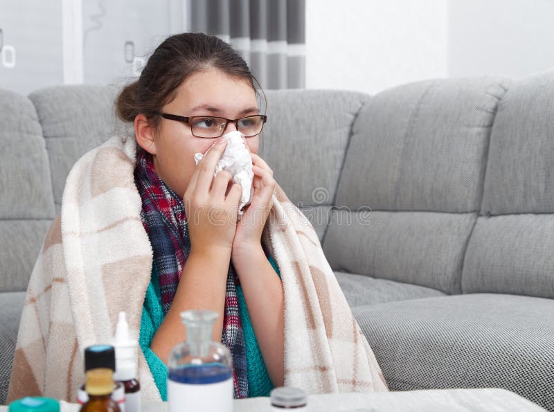 Sick Girl in Sofa with Medications on a Bedside Stock Image - Image of ...