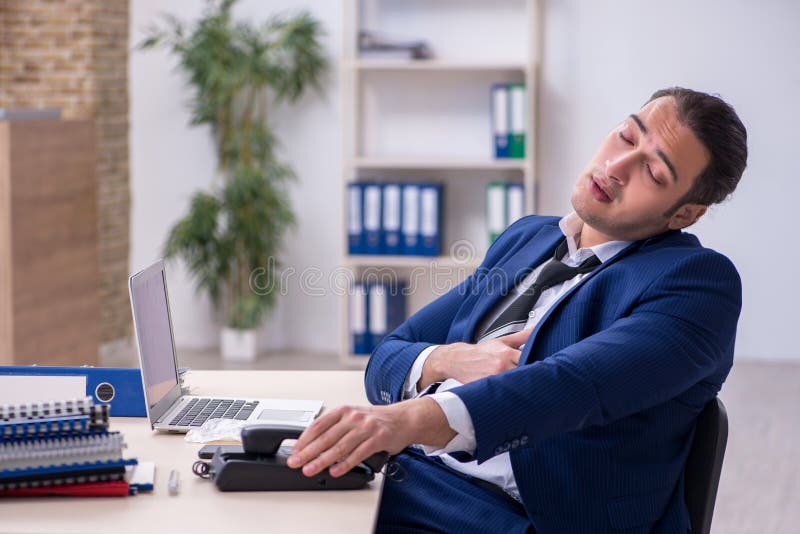 Sick Male Employee Suffering at Workplace Stock Image - Image of sick ...