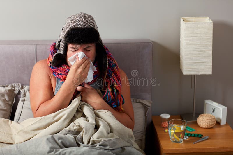 Sick Man with Cold Lying in Bed and Blow Nose. Stock Image - Image of ...