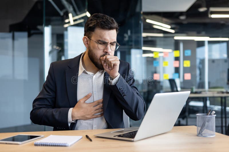 Sick Man Coughing and Having a Cold at Workplace. Businessman Working ...