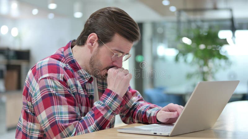 Sick Man Coughing while Working on Laptop in Cafe Stock Photo - Image ...