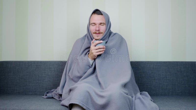 Sick And Angry Man Covered With Blanket And Looks Around Stock Video
