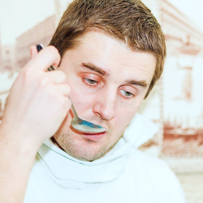A Young Handsome Cold Man Covers His Mouth Stock Image - Image of ...