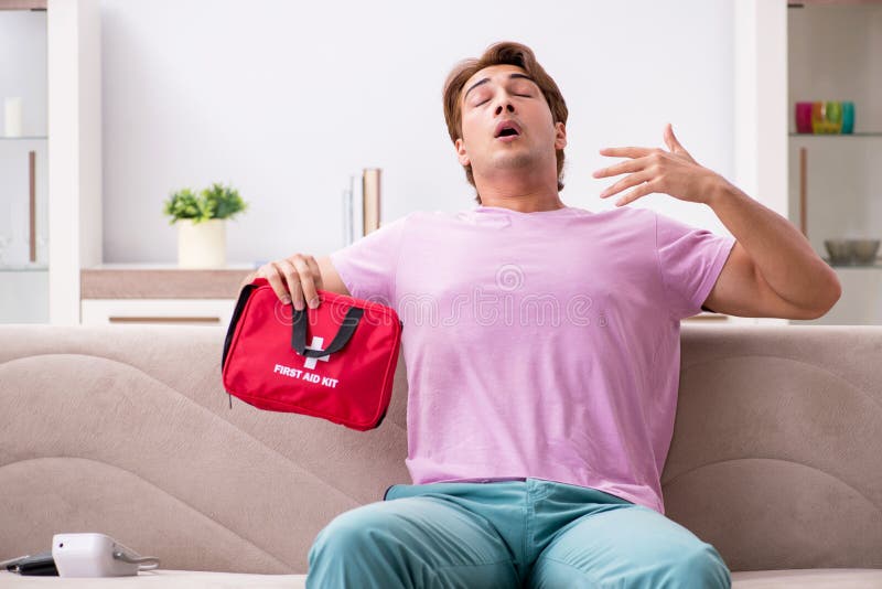 The Sick Man at Home with First Aid Kit Stock Image - Image of ...