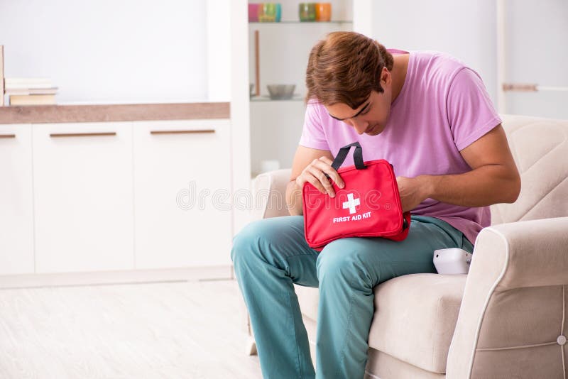 The Sick Man at Home with First Aid Kit Stock Photo - Image of home ...