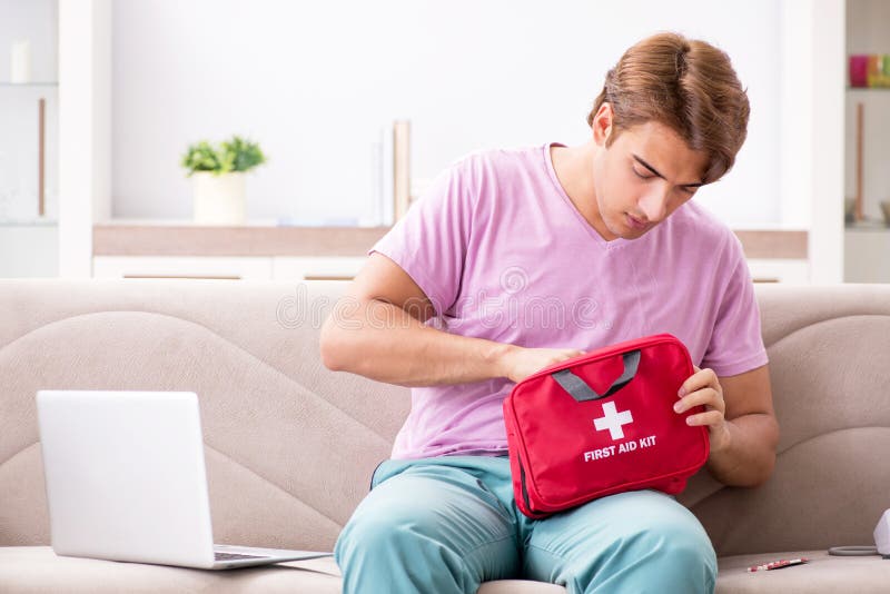The Sick Man at Home with First Aid Kit Stock Photo - Image of ...
