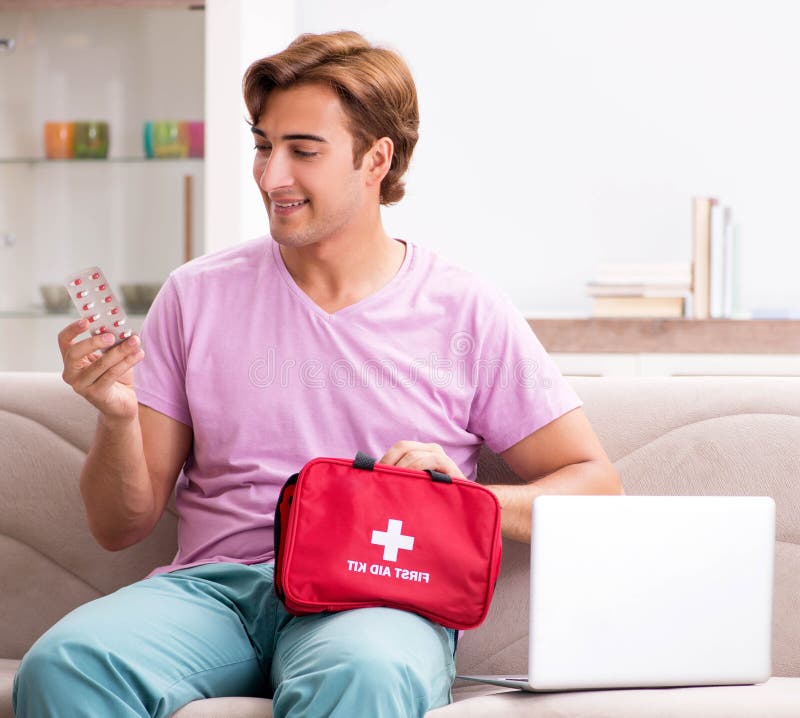 Sick Man at Home with First Aid Kit Stock Photo - Image of medic ...