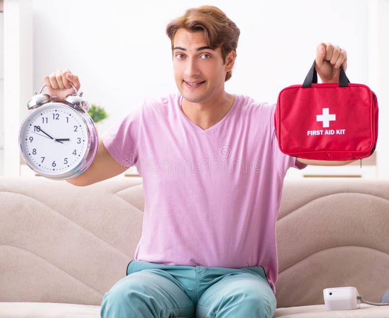 Sick Man at Home with First Aid Kit Stock Photo - Image of house, cross ...