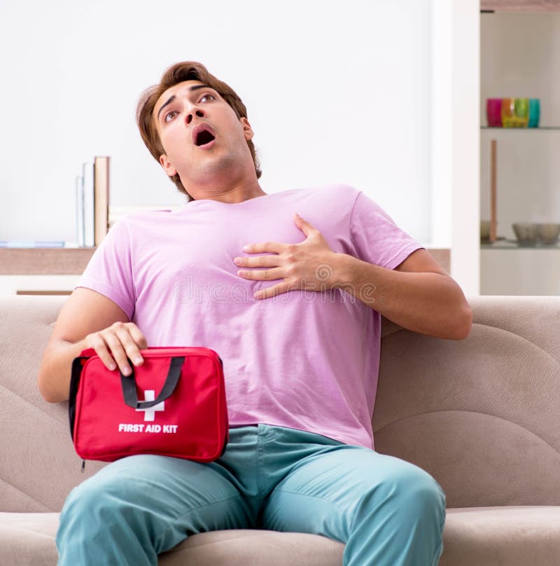 Sick Man at Home with First Aid Kit Stock Photo - Image of help, couch ...