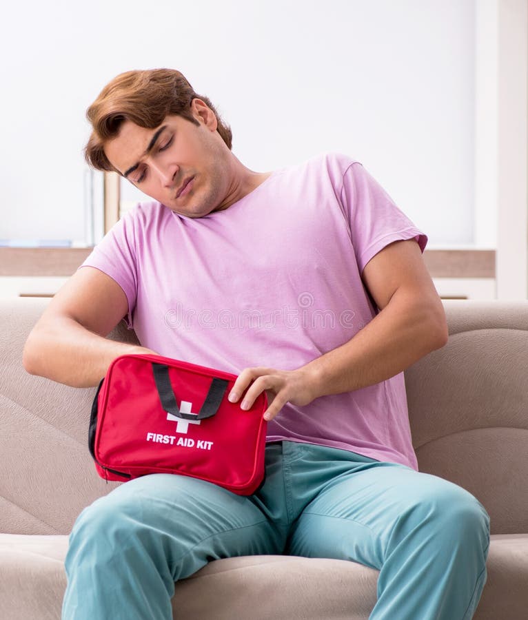 Sick Man at Home with First Aid Kit Stock Photo - Image of insurance ...