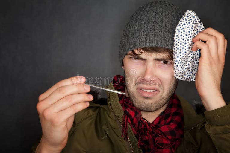 Sick Man with Ice Pack and Thermometer Stock Photo - Image of cold ...