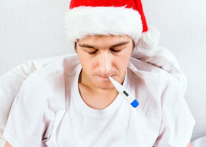 Sick Man in Santa Hat stock image. Image of indoor, grippe - 159749785