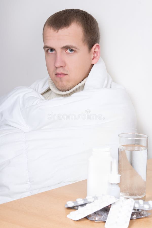 Sick Man Sitting and Table with Glass of Water and Pills Stock Image ...