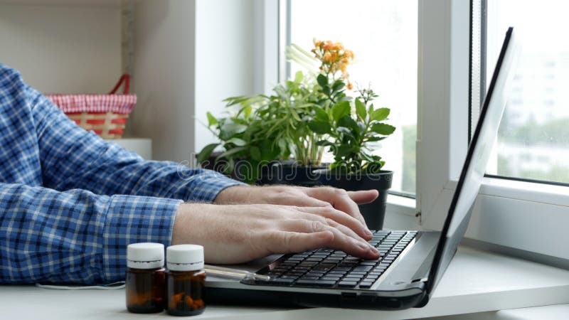 Sick Man Working Remote from Home Using Computer Wireless Connection ...
