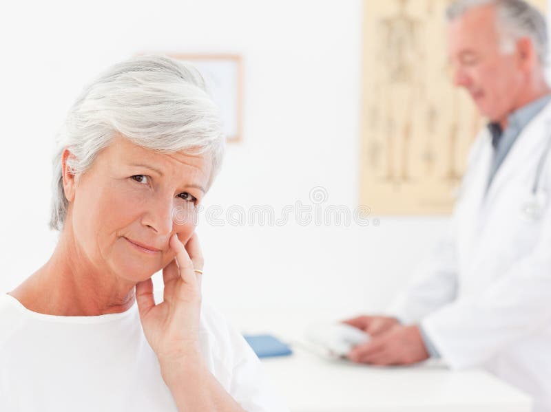 Sick Patient with Her Doctor Stock Photo - Image of indoors, pulse ...