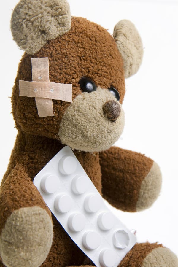 Sick Teddy Bear with Pills. Stock Image - Image of shot, childhood: 7901907