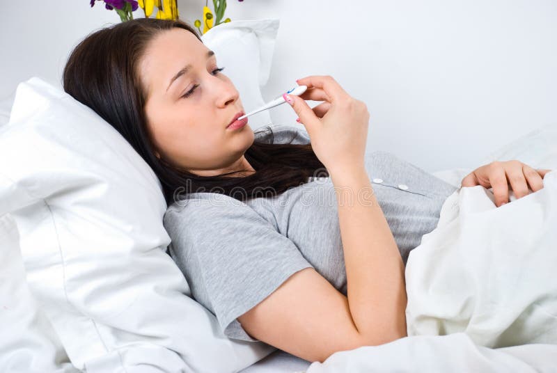 Sick woman with fever stock image. Image of healthcare - 14147747