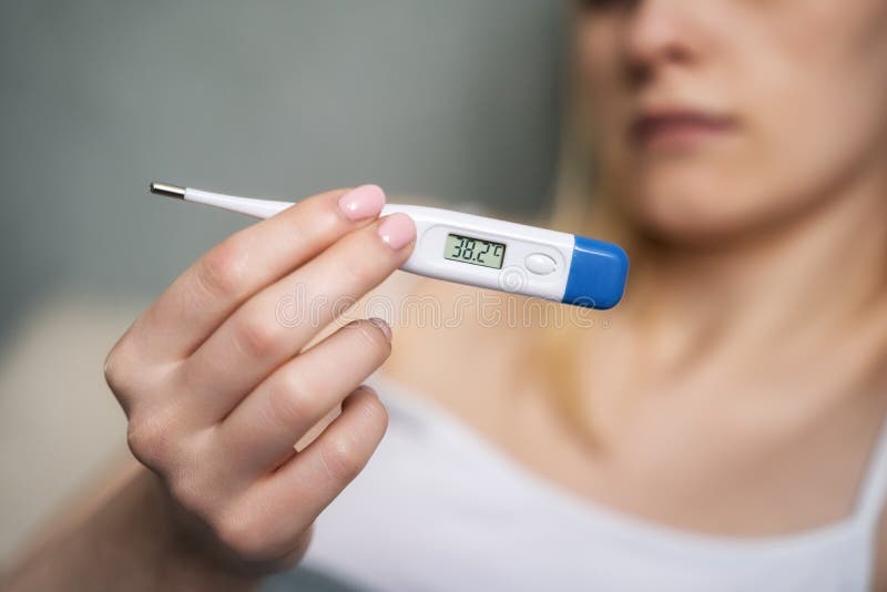 Sick Woman Taking Her Temperature Stock Image - Image of sickness ...